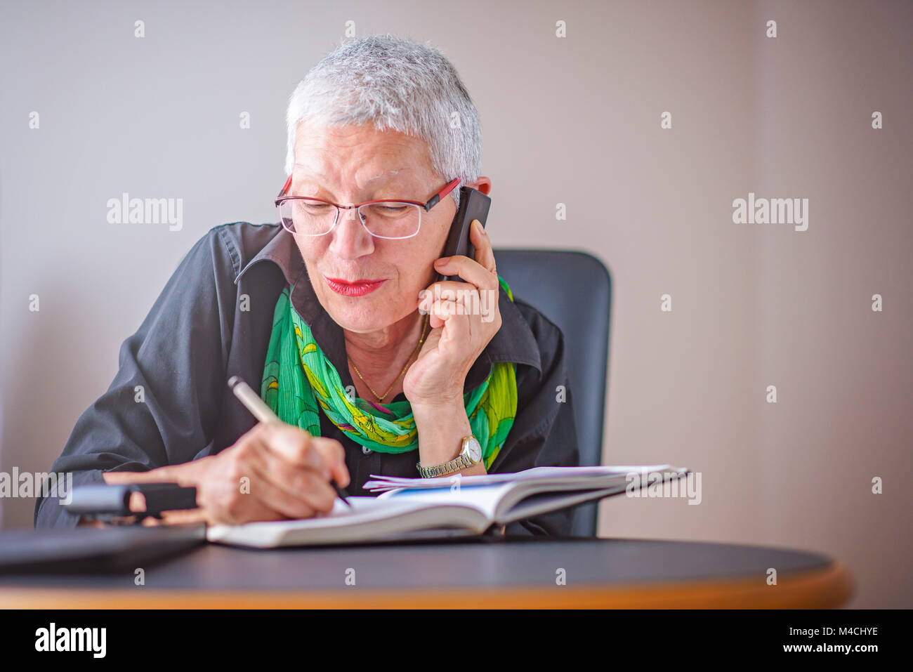 Cheerful woman taking paper hi-res stock photography and images - Alamy