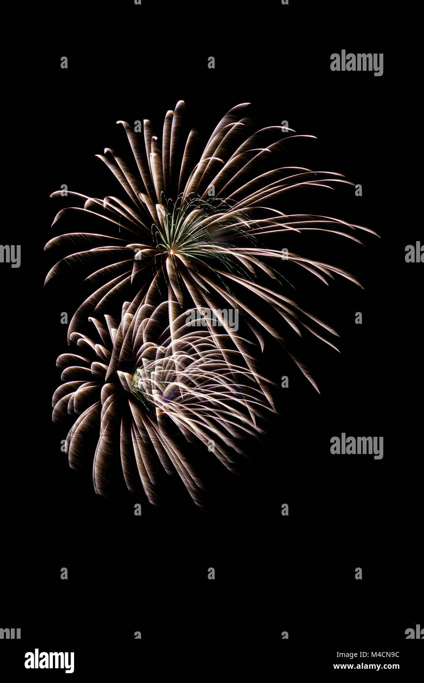 multiple fireworks explode with black background Stock Photo - Alamy