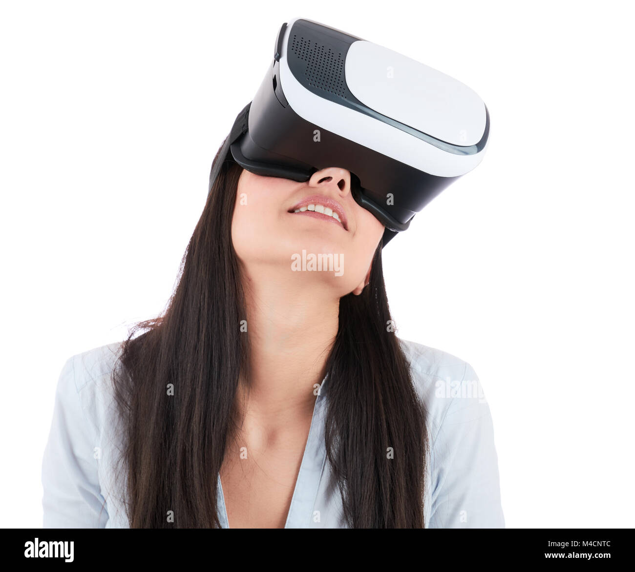 Young woman is using VR headset isolated on white background Stock ...