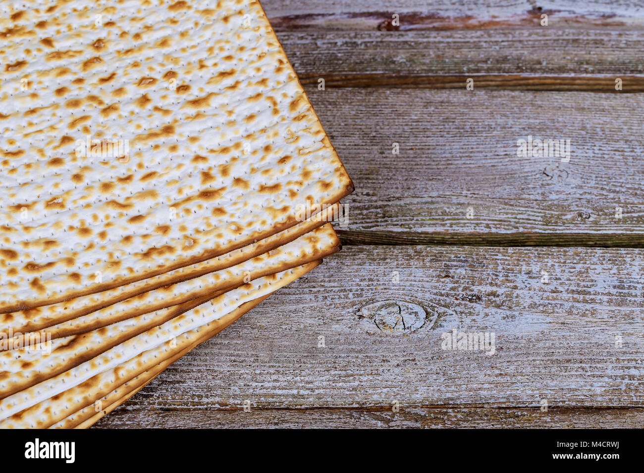 Closeup of Passover Matzah passover background. matzoh over wooden ...