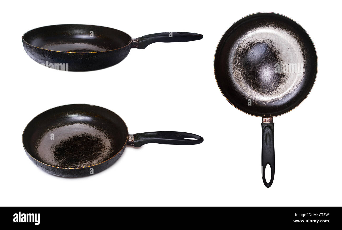 Set of three scratched old pans on white background Stock Photo - Alamy