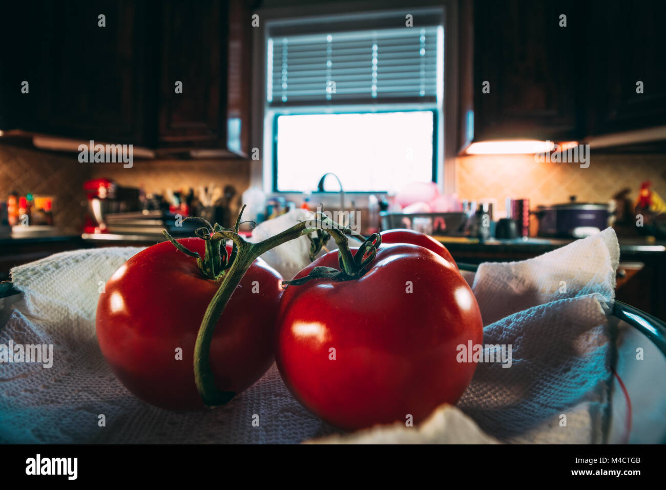 Tomatoes in a Kitchen Stock Photo - Alamy