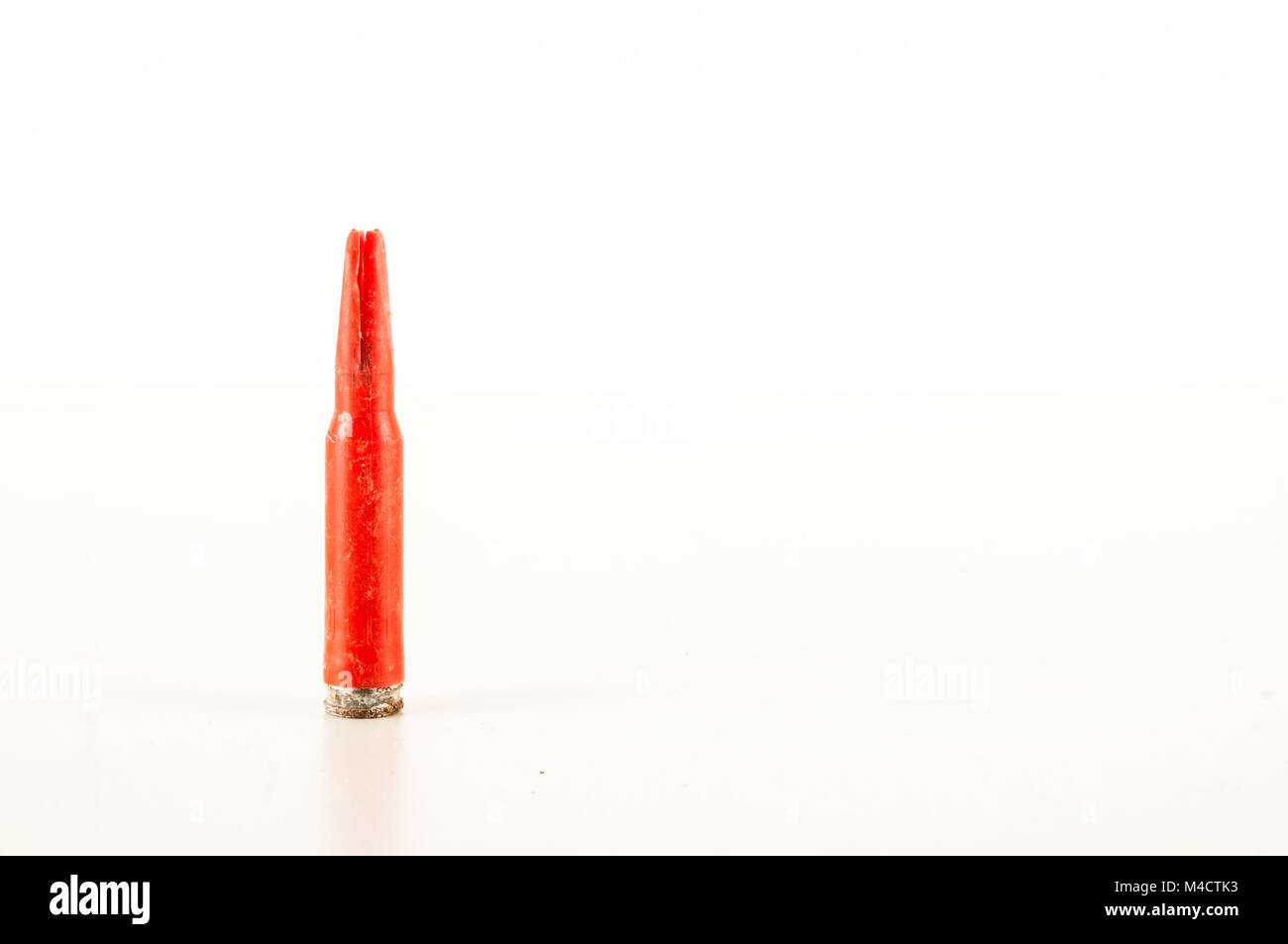 Close-up of plastic bullet Object on a White Background Stock Photo - Alamy