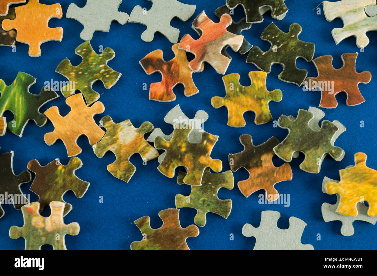 Photo picture of Jigsaw puzzle Background or texture Stock Photo - Alamy