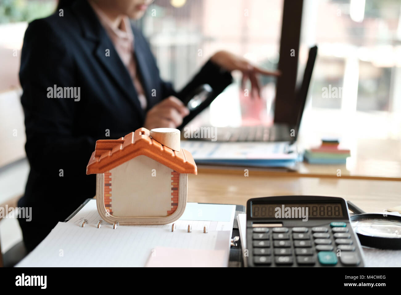 Female estate agent working desk hi-res stock photography and images ...