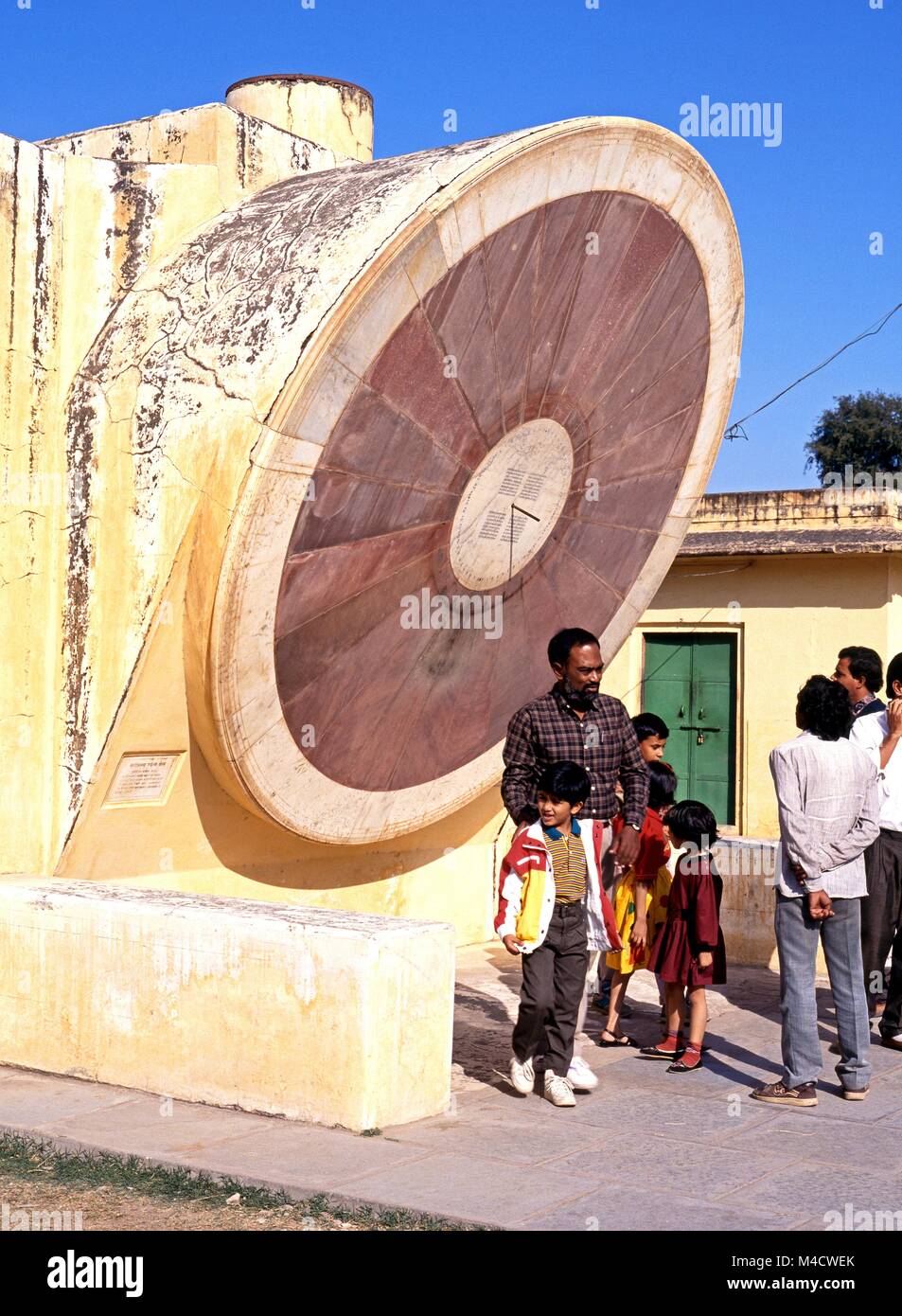 People looking at the giant sundial known as the Samrat Yantra at ...