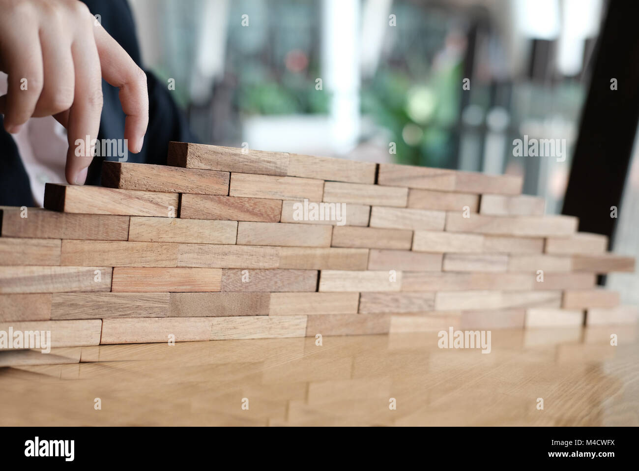 businessman finger climbing stairs made by wood block. hand walking up ...