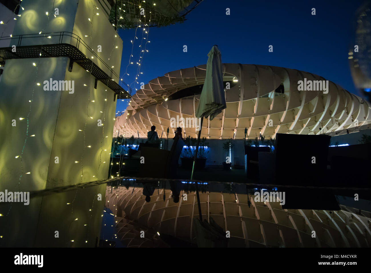 a romantic rooftop scene in Seville, Spain Stock Photo - Alamy