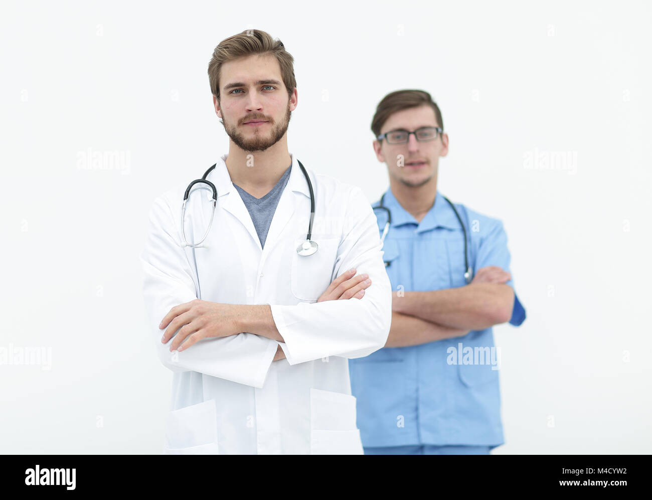 confident doctor and assistant .isolated on white Stock Photo - Alamy