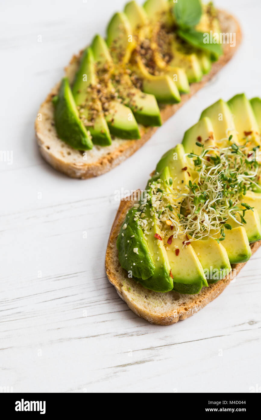 Avocado on bread hi-res stock photography and images - Alamy