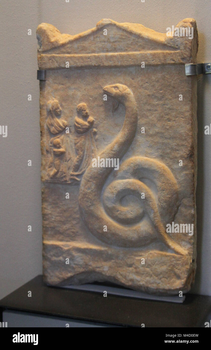 Votive relief with snake hi-res stock photography and images - Alamy