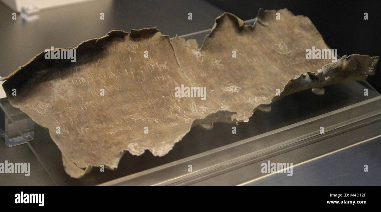 Latin double-sided defixio scroll against Domitia Omonia and eleven ...