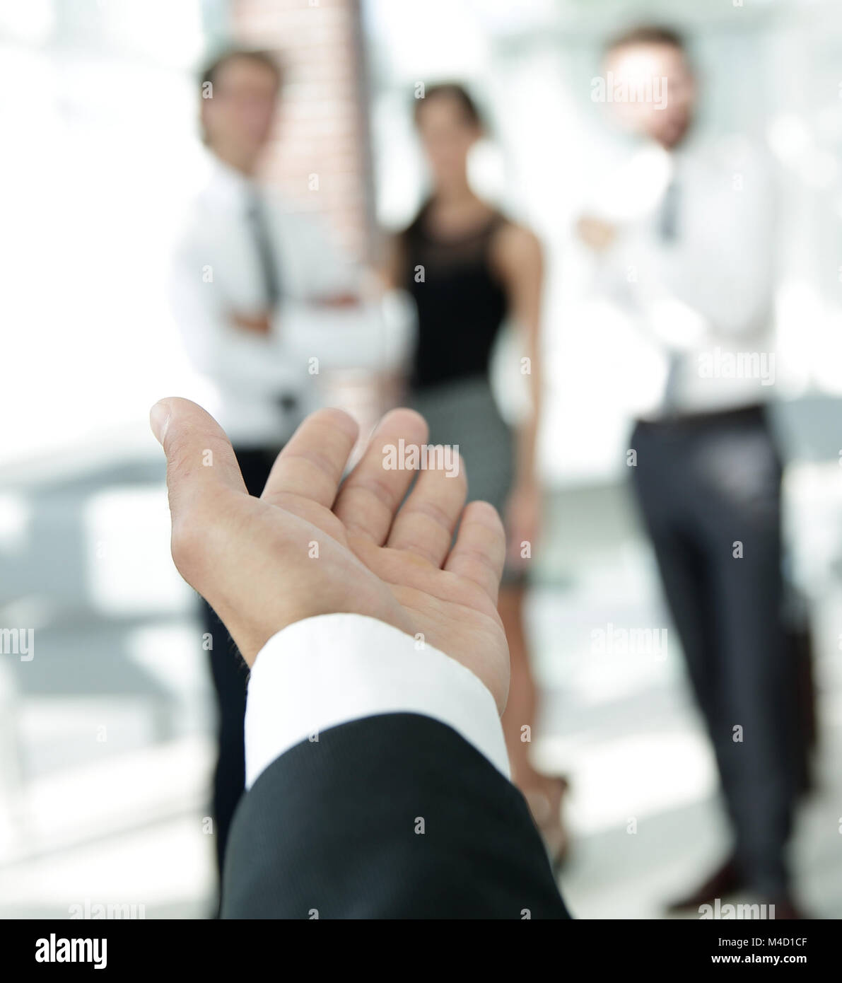 background image of businessman holding out hand for a handshake Stock ...