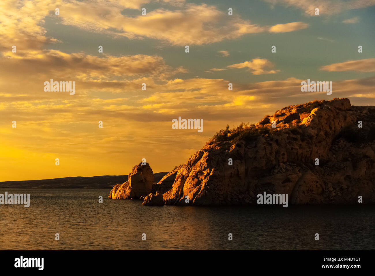 Rock formation on the Lake Mead National Recreation Area enlightened by ...