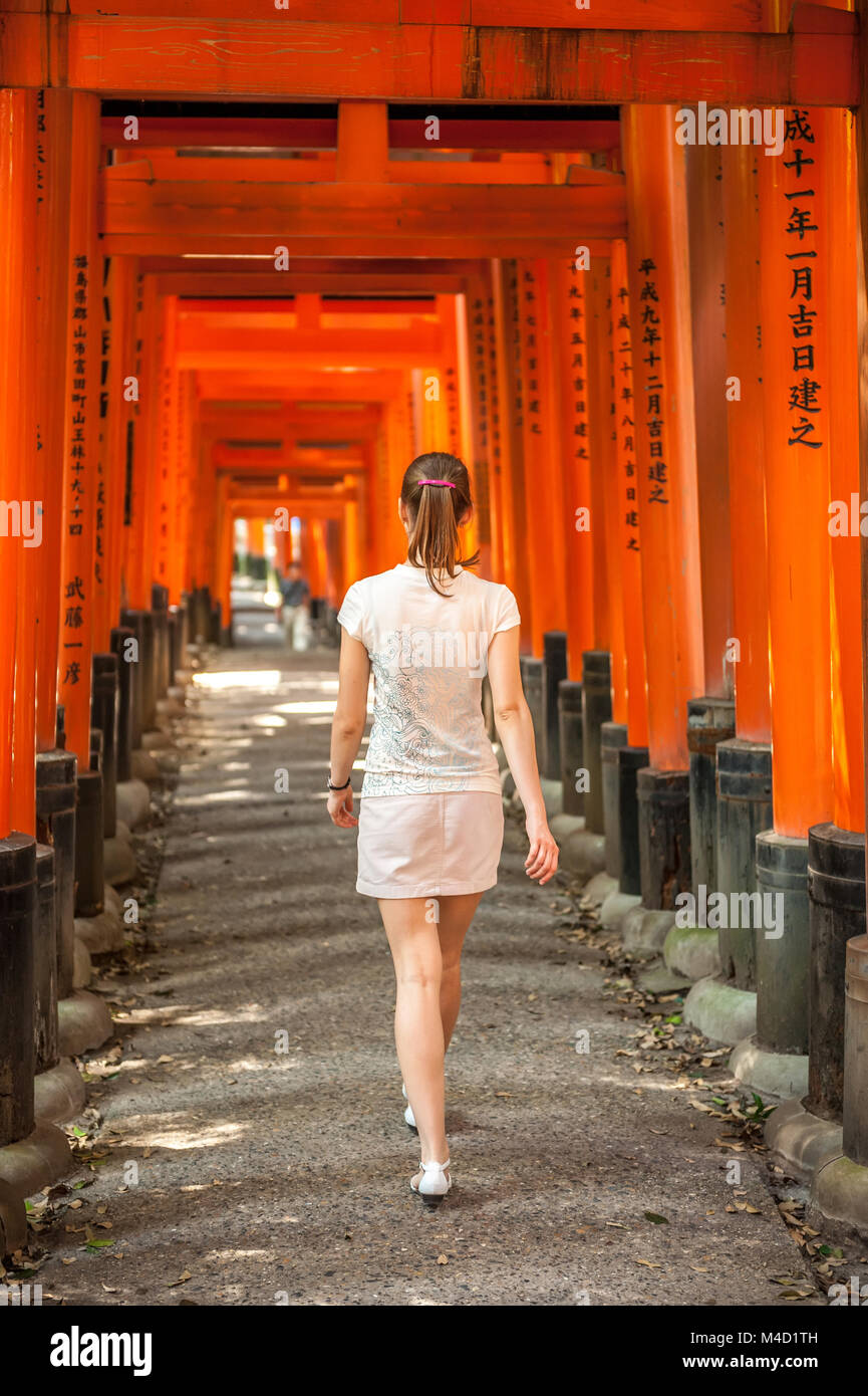 Woman walking through city gates hi-res stock photography and images ...