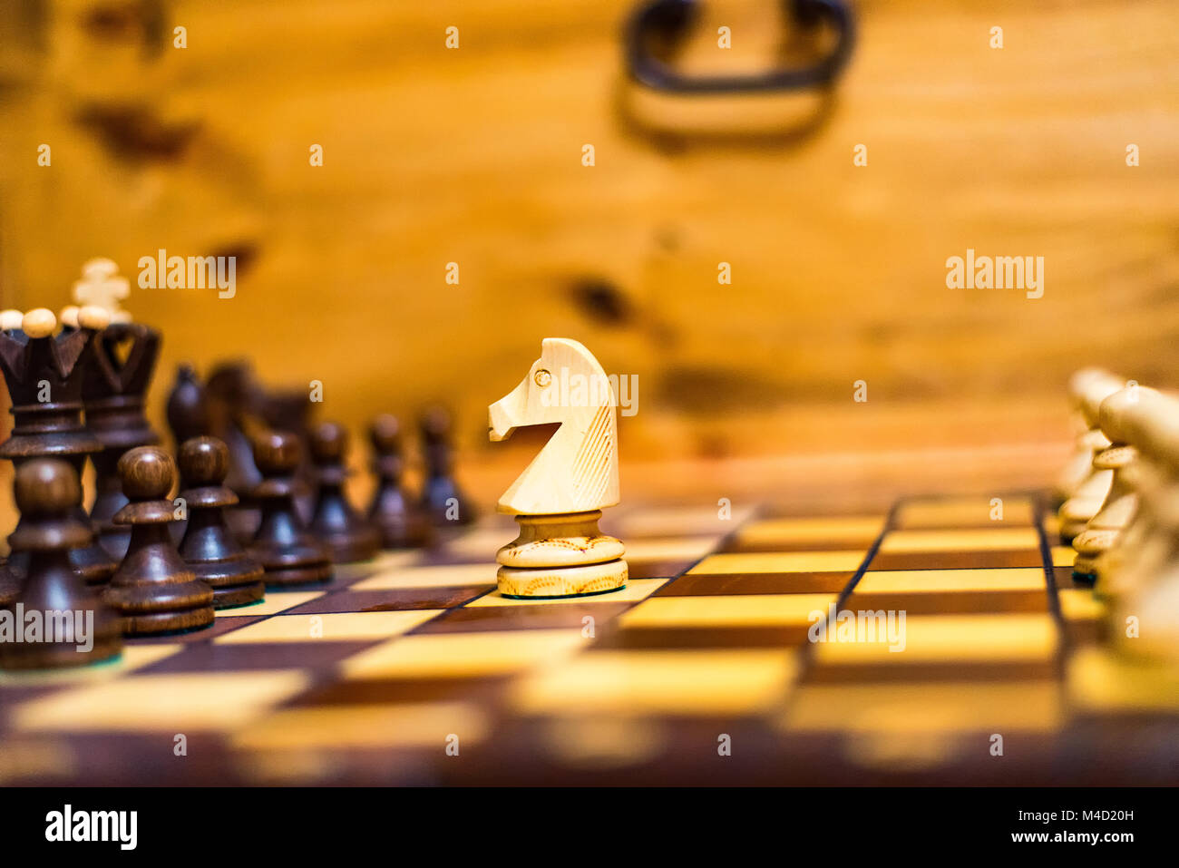 The horse is attacking the pawn in chess Stock Photo - Alamy