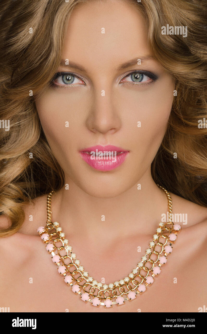 Portrait woman long necklace hi-res stock photography and images - Alamy