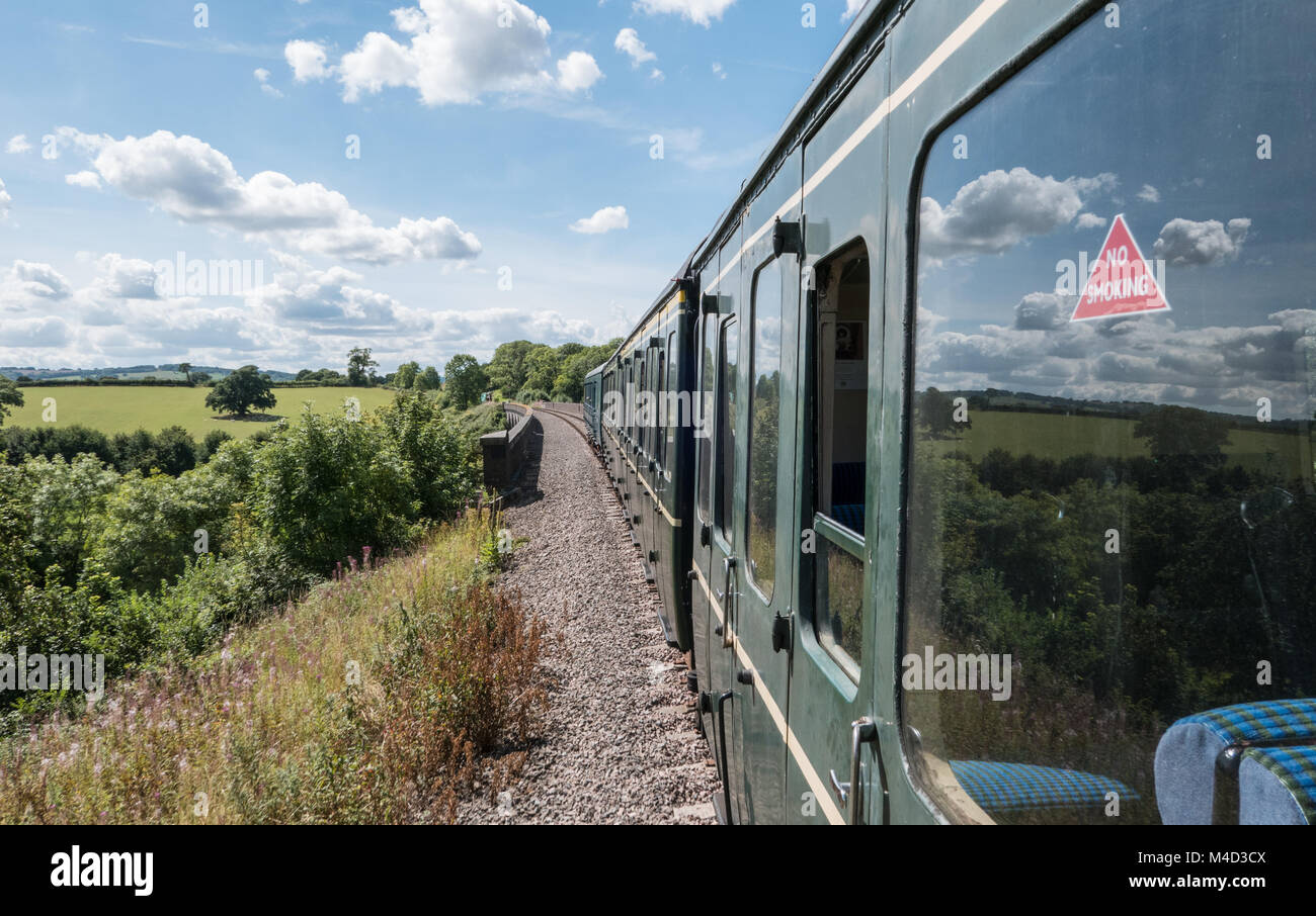 View from railway carriage window along the length of a train on The ...