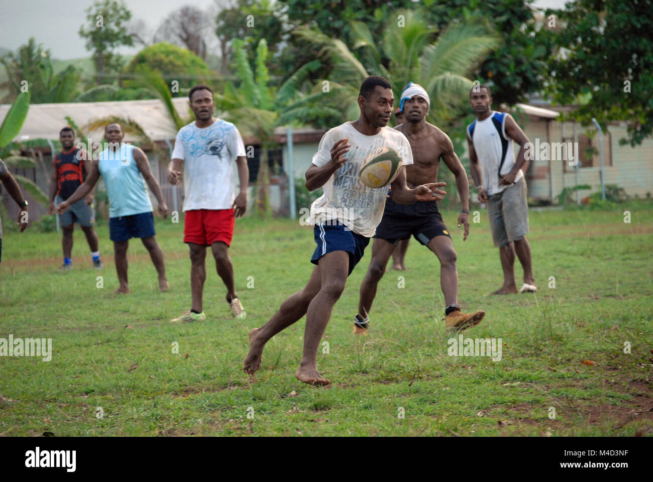 Fijian men playing rugby, Rakiraki playing field, Fiji Stock Photo - Alamy