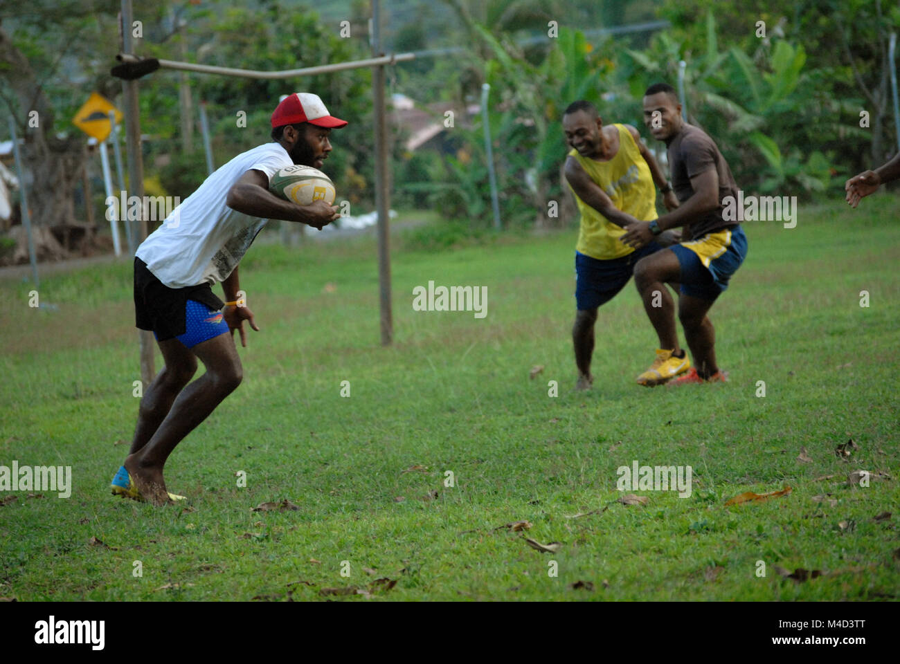 Fijian men playing rugby, Rakiraki playing field, Fiji Stock Photo - Alamy