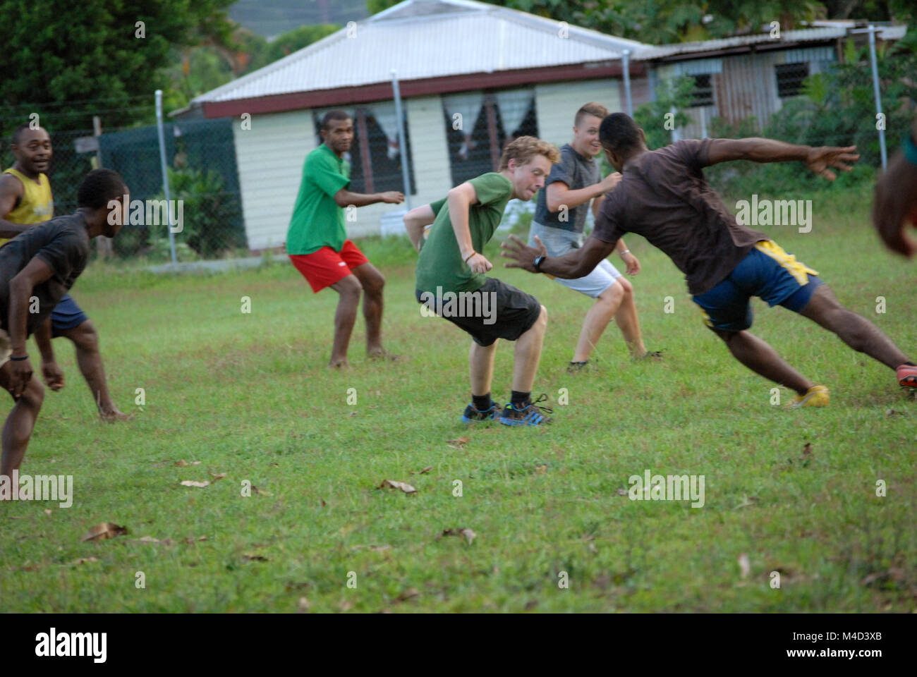 Fijian men playing rugby, Rakiraki playing field, Fiji Stock Photo - Alamy