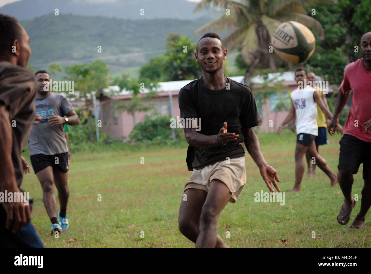 Fijian men playing rugby, Rakiraki playing field, Fiji Stock Photo - Alamy