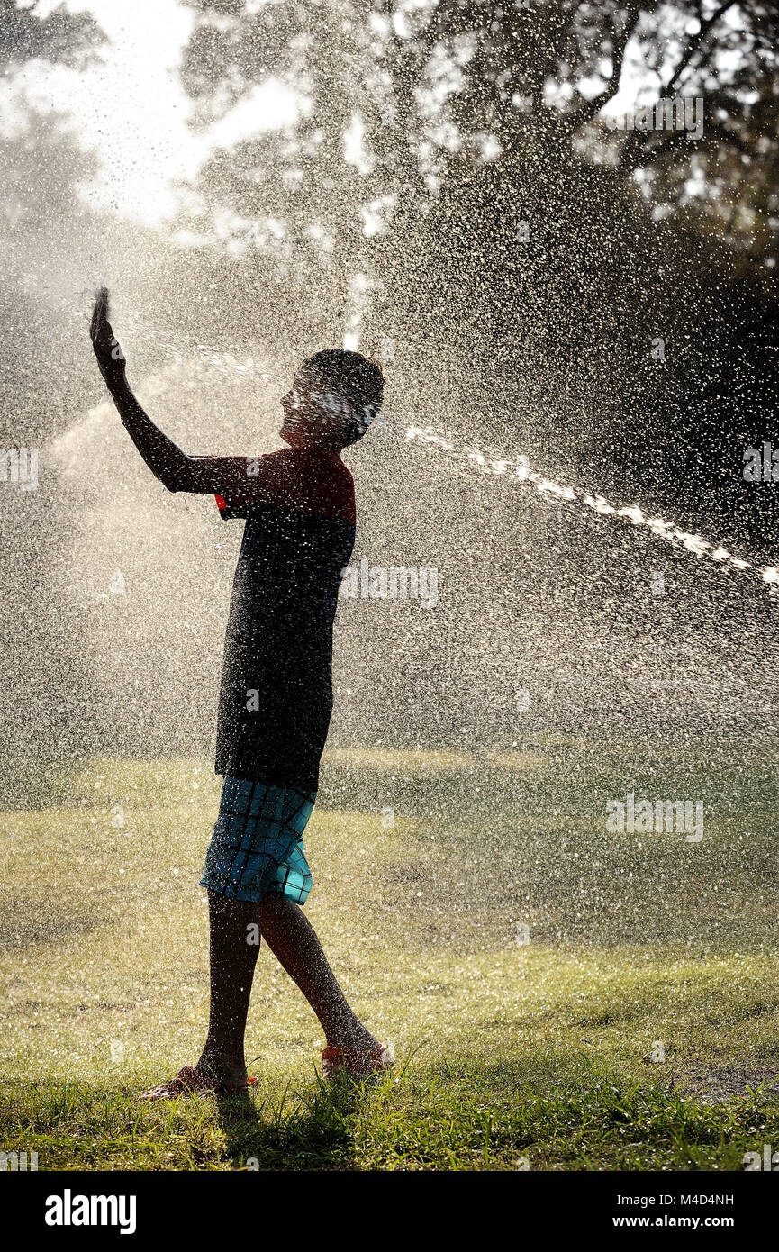Play with water jets Stock Photo - Alamy