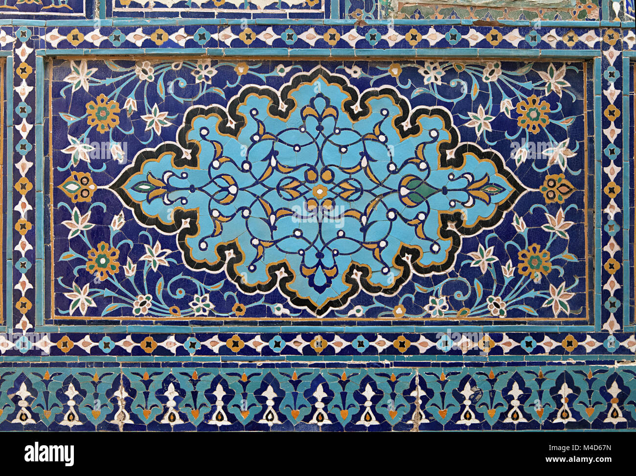 Old Eastern mosaic on the wall, Uzbekistan Stock Photo - Alamy