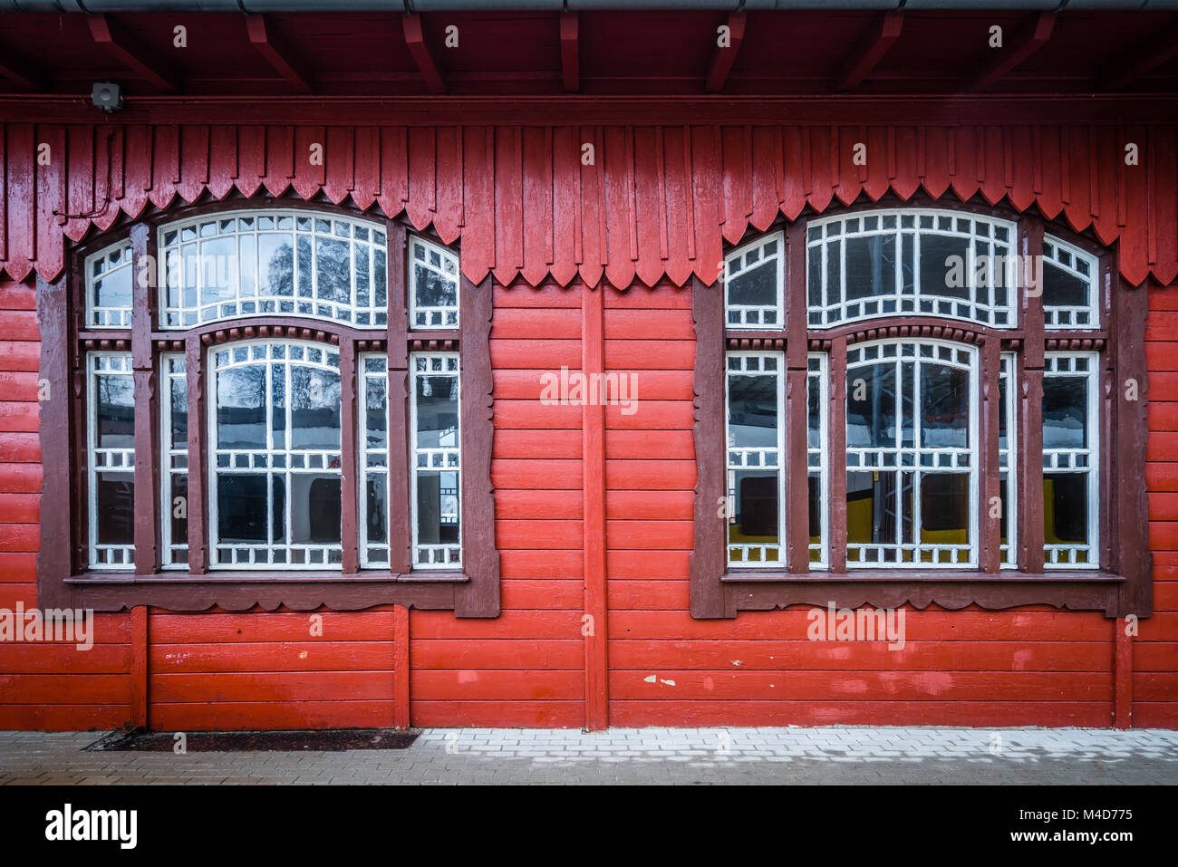 Windows and wooden building facade Stock Photo - Alamy