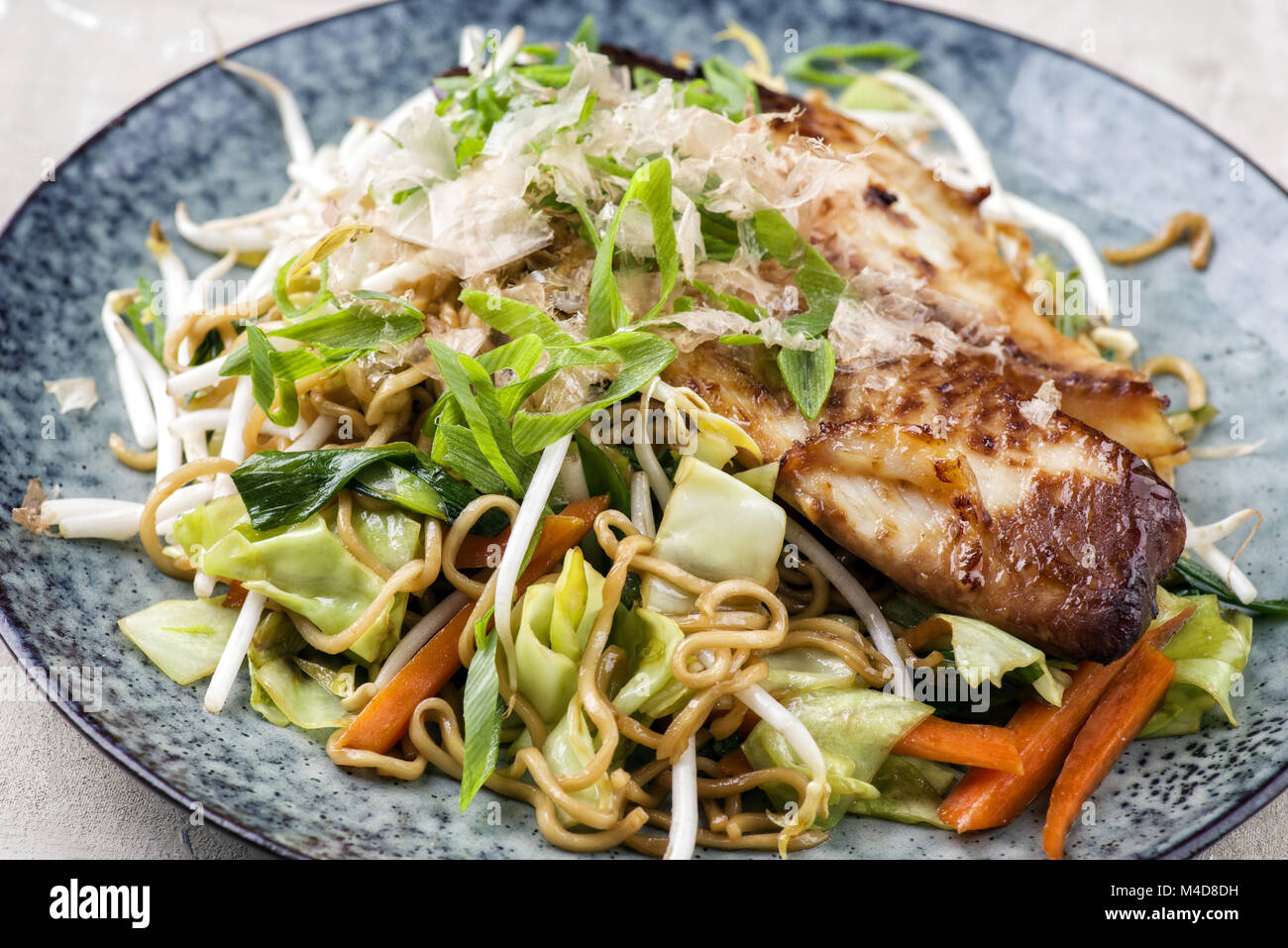 Yakisoba Noodles with Fish Teriyaki Stock Photo - Alamy