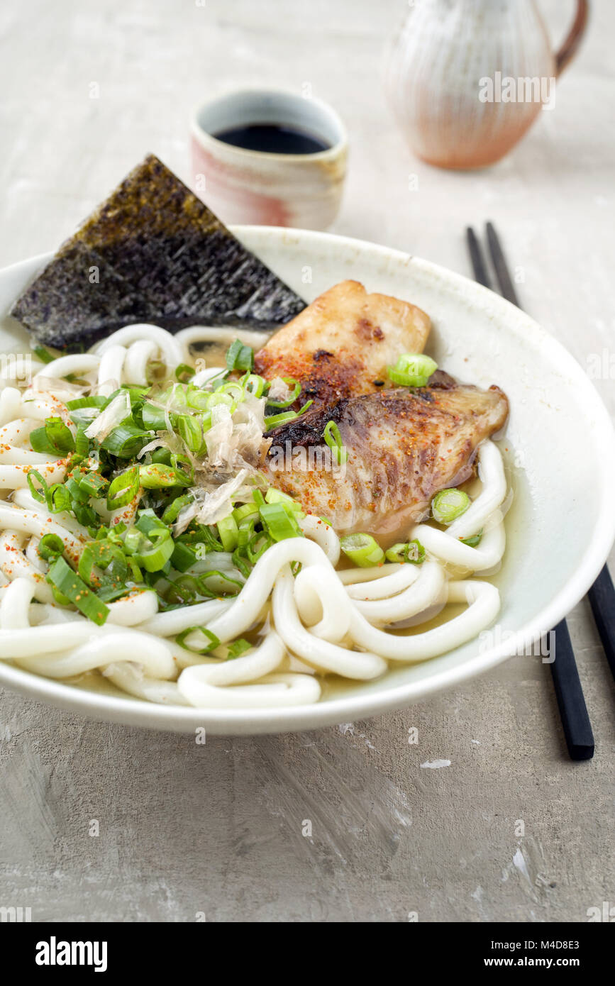 Udon Fish Soup in Bowl Stock Photo - Alamy