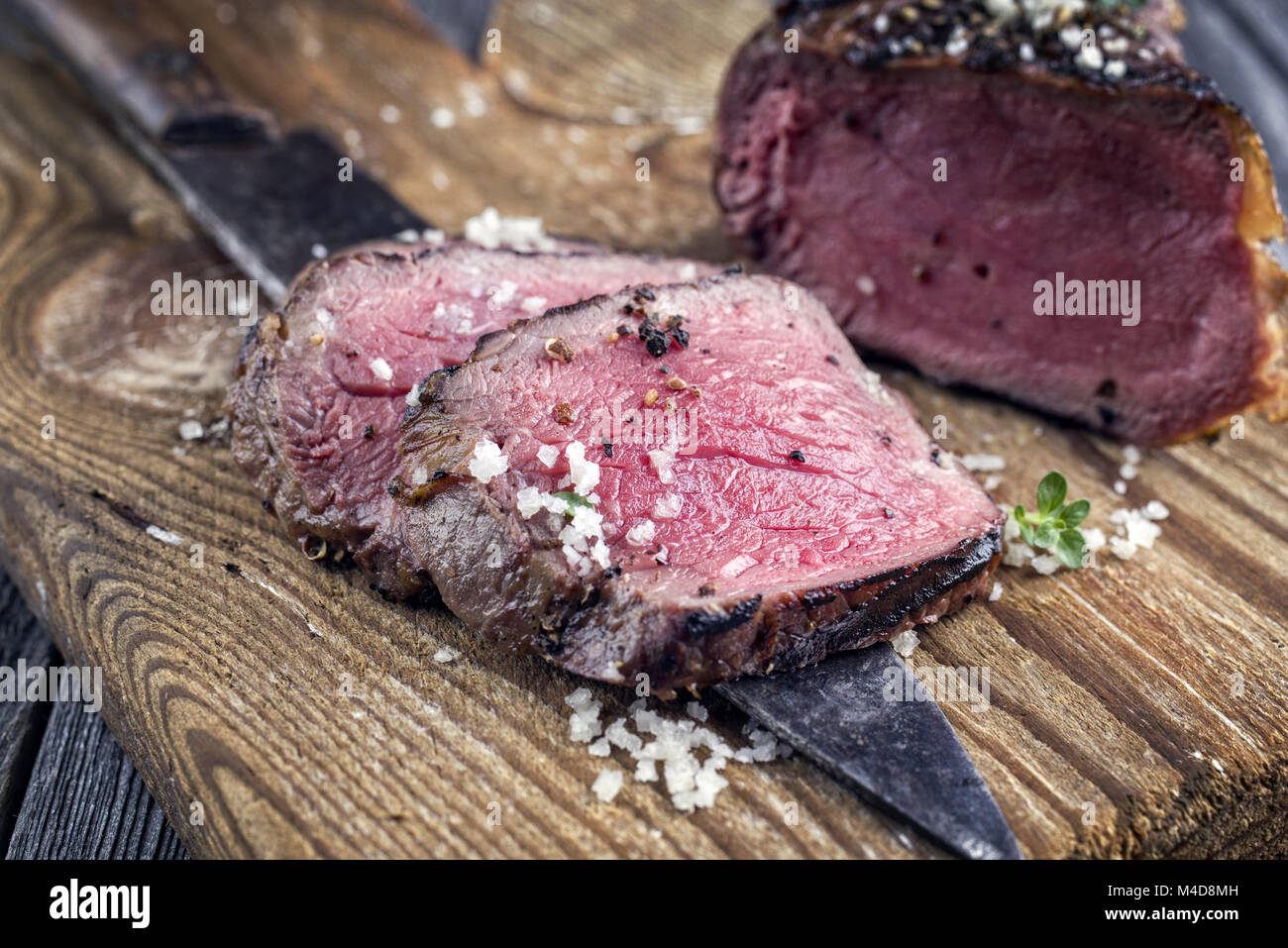 Filet mignon on chopping board hi-res stock photography and images - Alamy