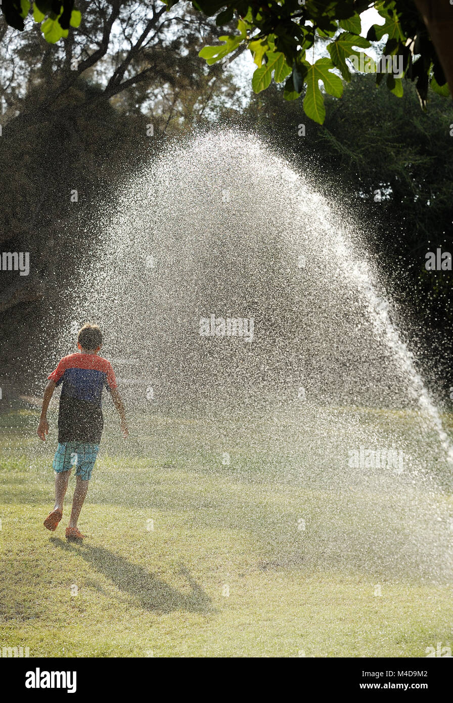 Play with water jets Stock Photo - Alamy