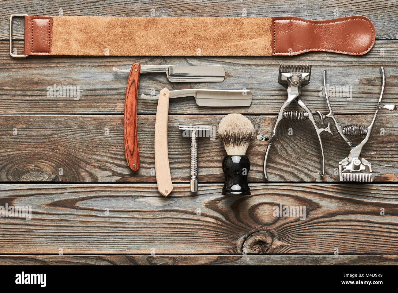 Vintage barber shop tools on wooden background Stock Photo - Alamy