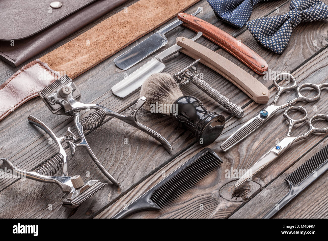 Vintage barber shop tools on wooden background Stock Photo - Alamy