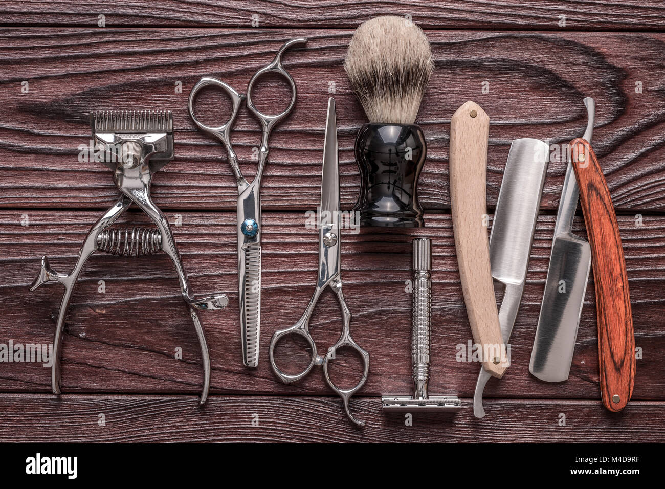 Vintage barber shop tools on wooden background Stock Photo - Alamy