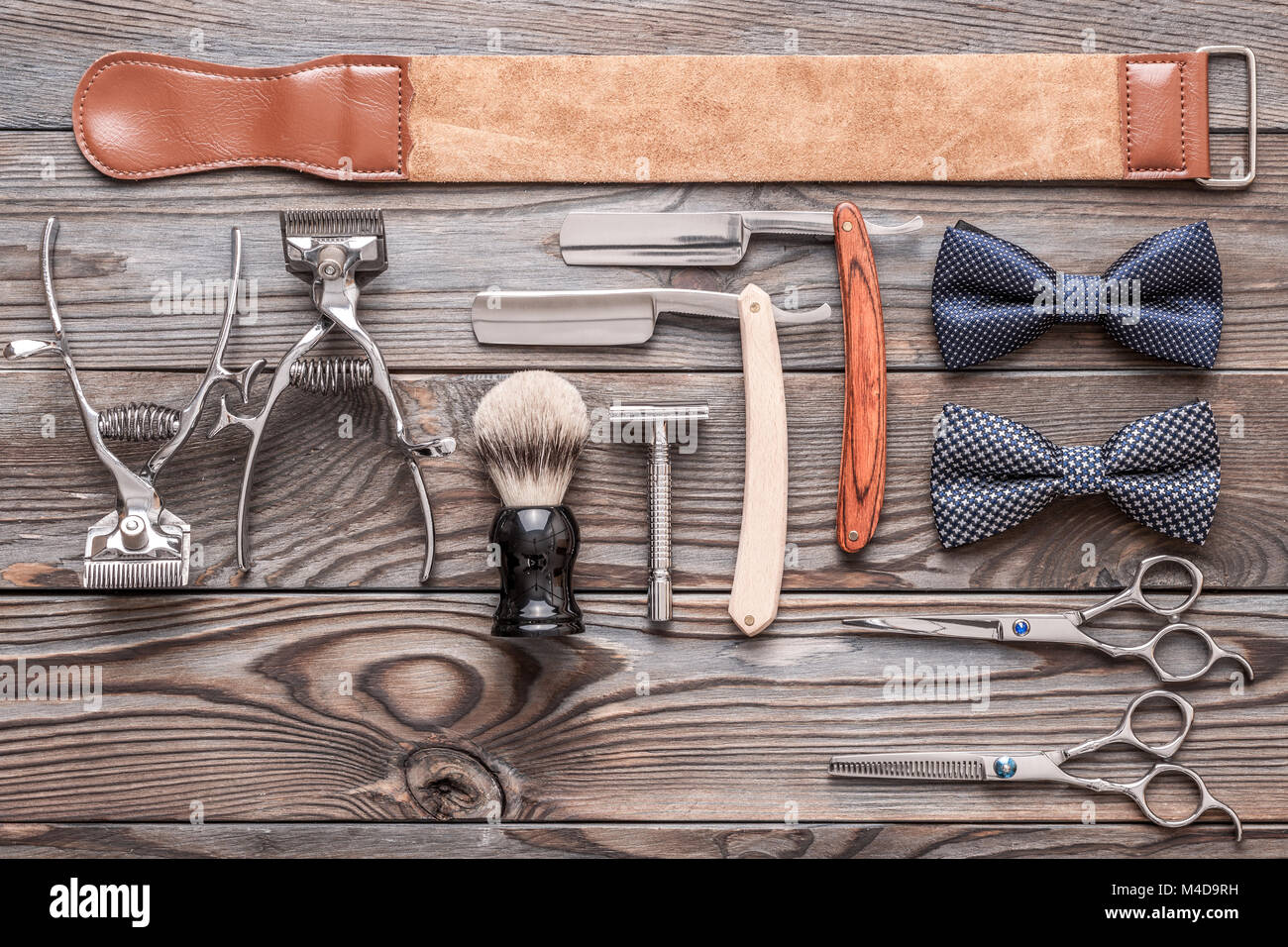 Vintage barber shop tools on wooden background Stock Photo - Alamy