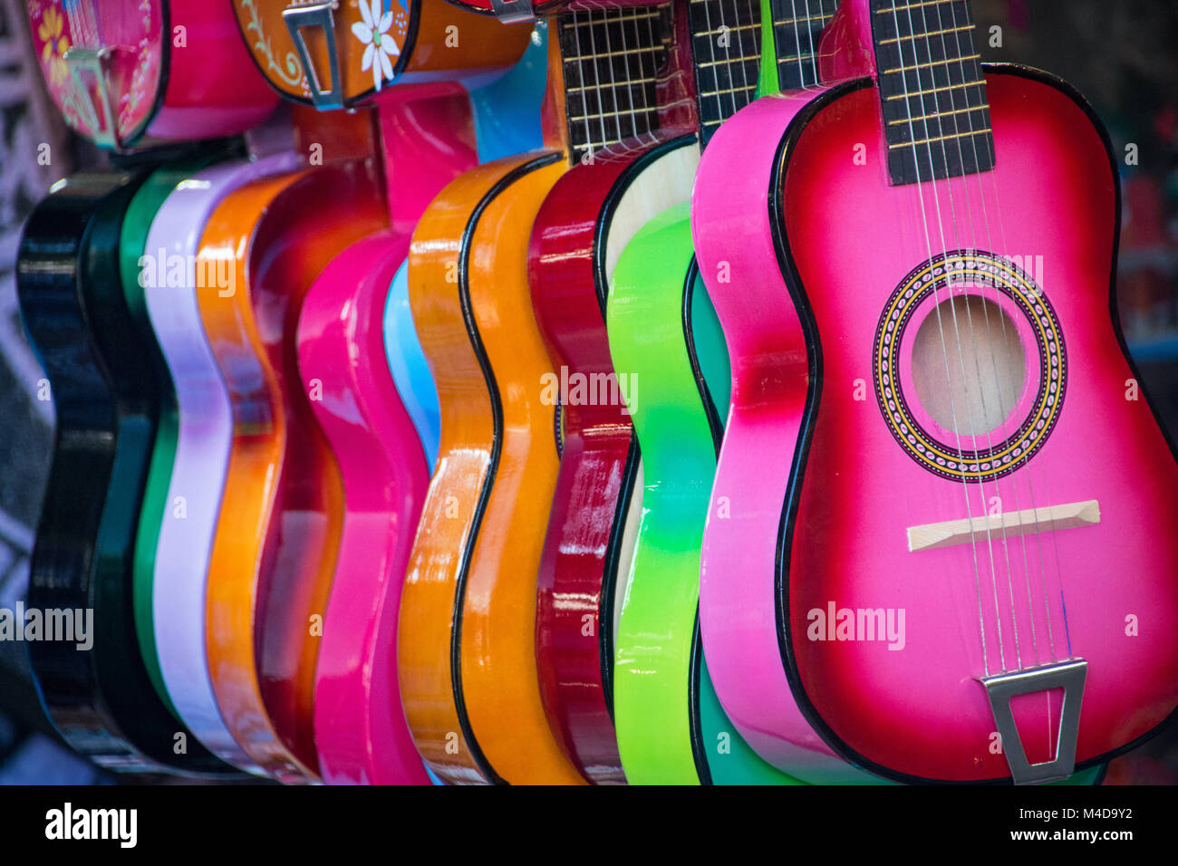 Wooden ukuleles hi-res stock photography and images - Alamy