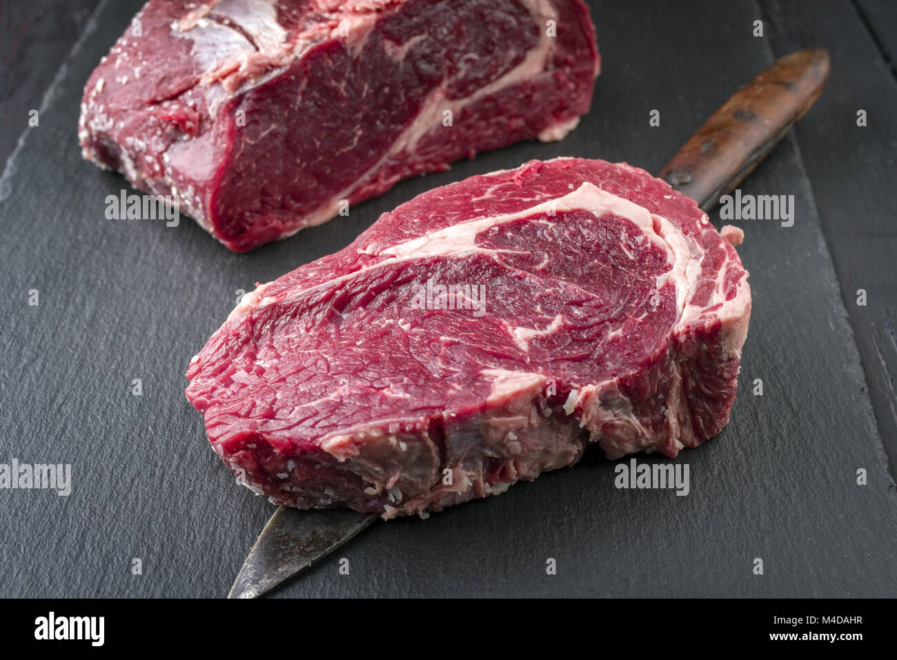 Dry Aged Kobe Rib Eye Steak on a Slate Slab Stock Photo - Alamy