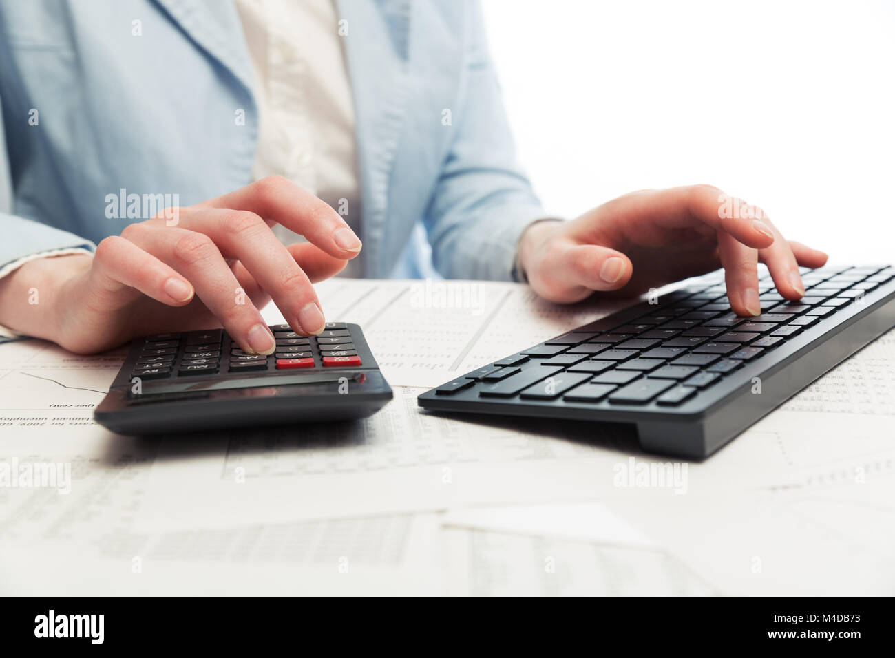 Financial accounting. Business woman using computer keyboard Stock ...