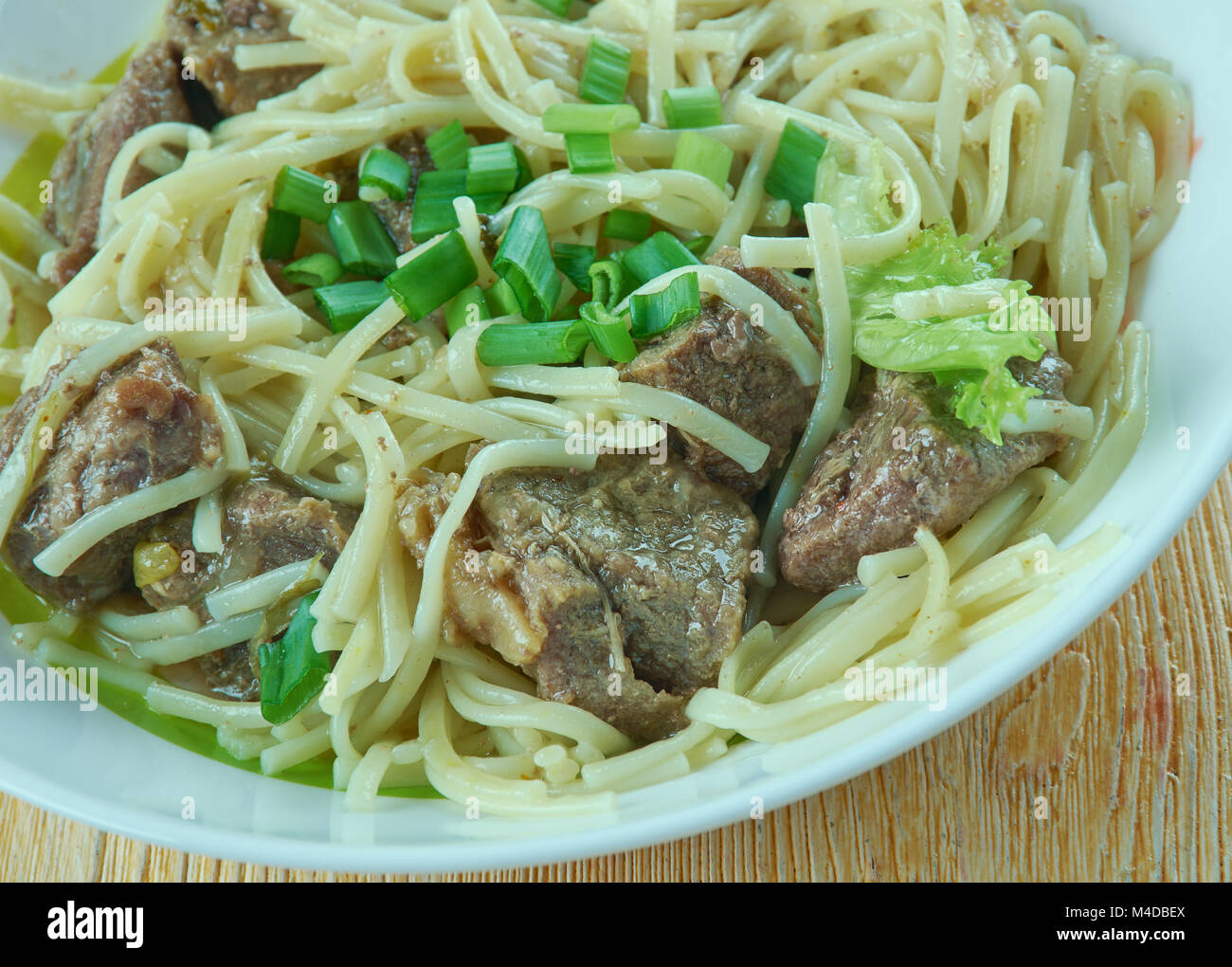 boiled lamb with noodles Stock Photo - Alamy