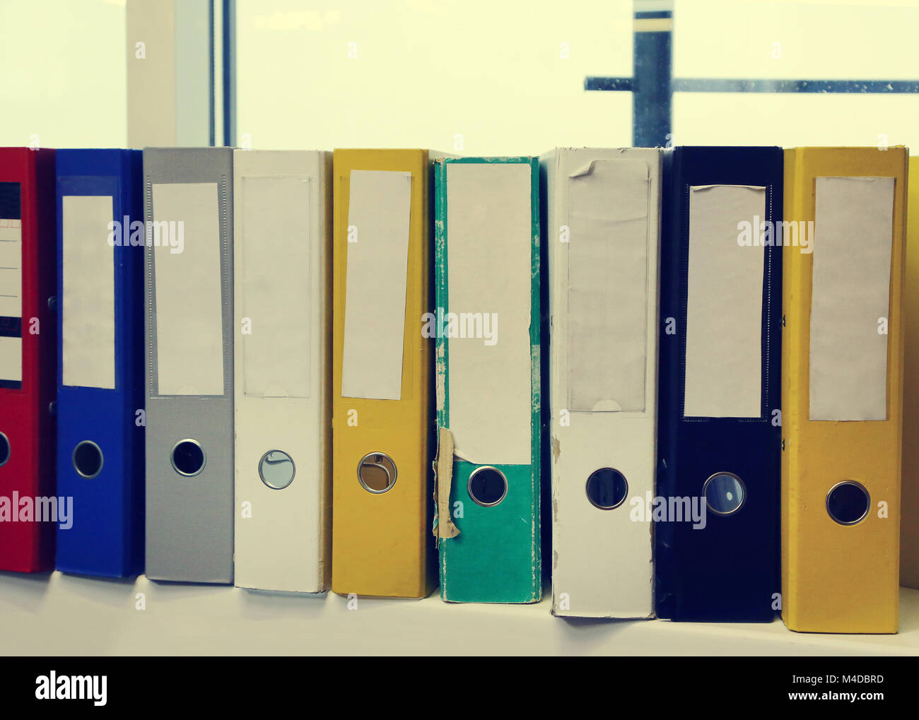 Dirty folders for papers Stock Photo - Alamy