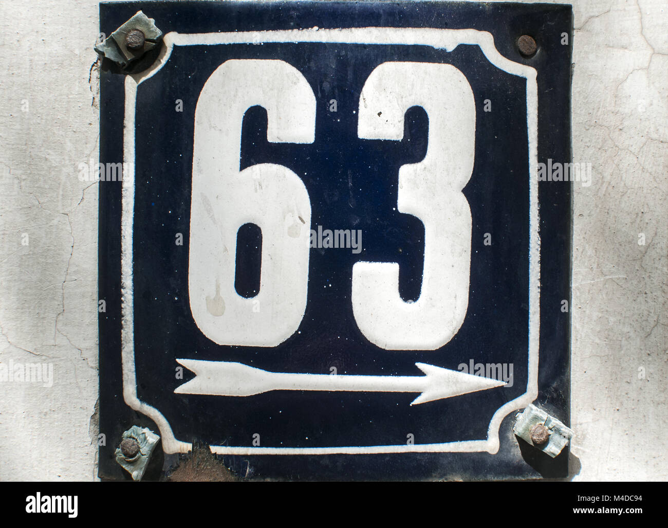 Weathered enameled plate number 63 Stock Photo - Alamy Weathered enameled plate number 63 Stock Photo - Alamy