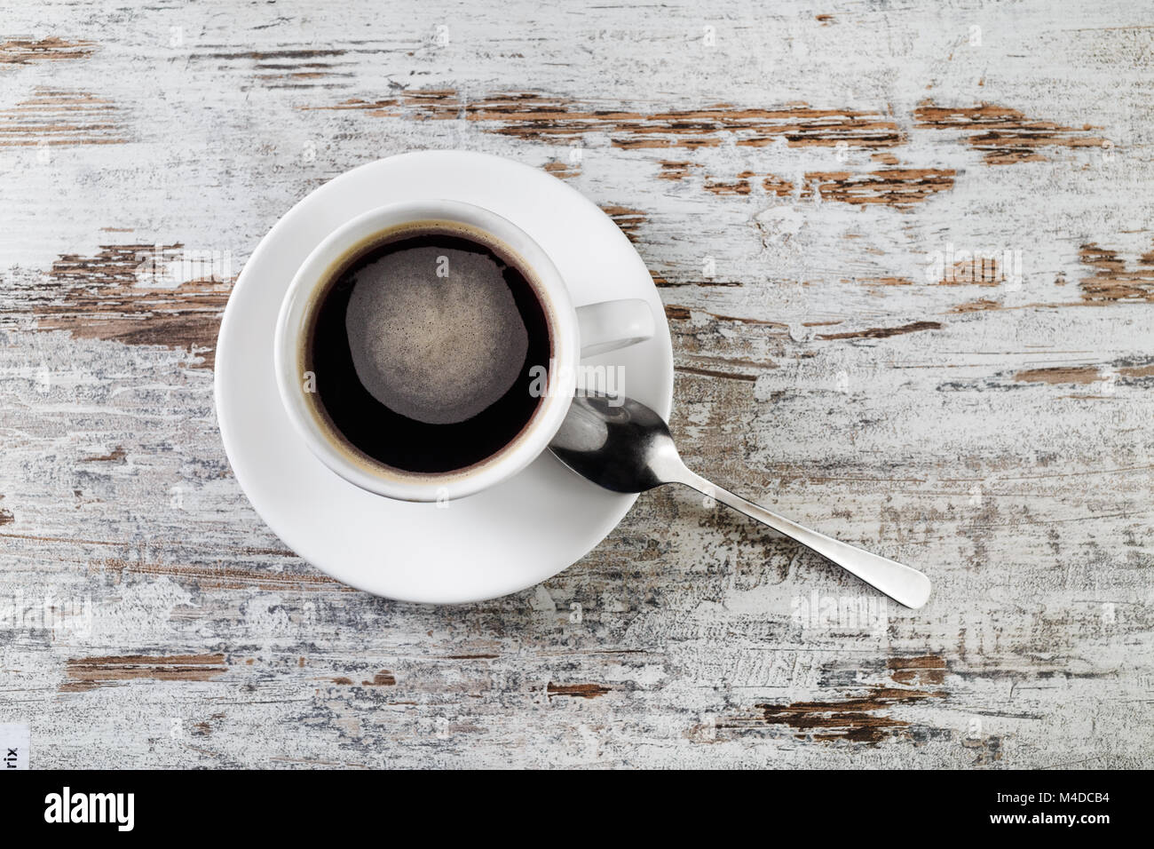 Coffee cup and spoon Stock Photo - Alamy