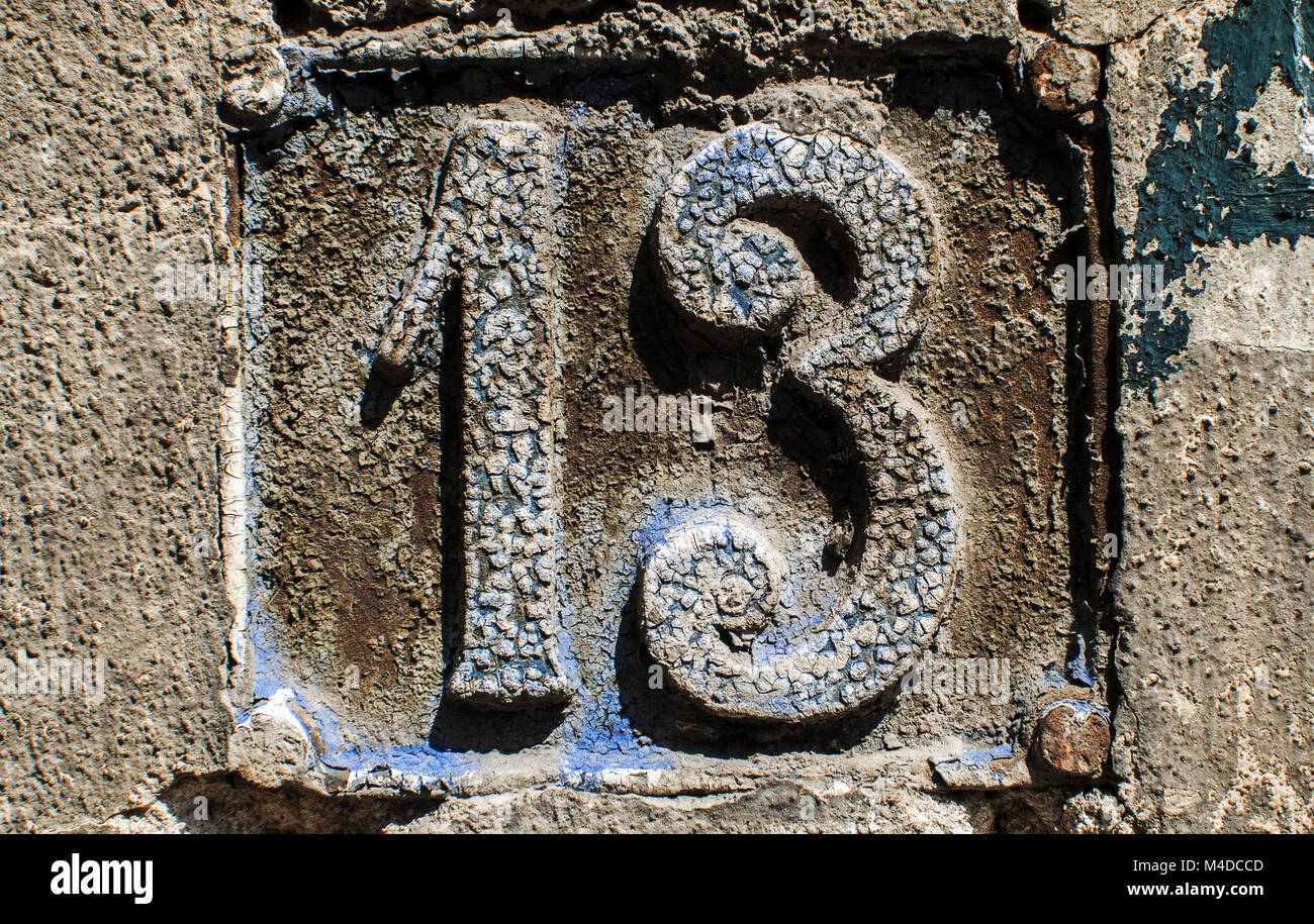 Old retro cast iron plate number 13 Stock Photo - Alamy