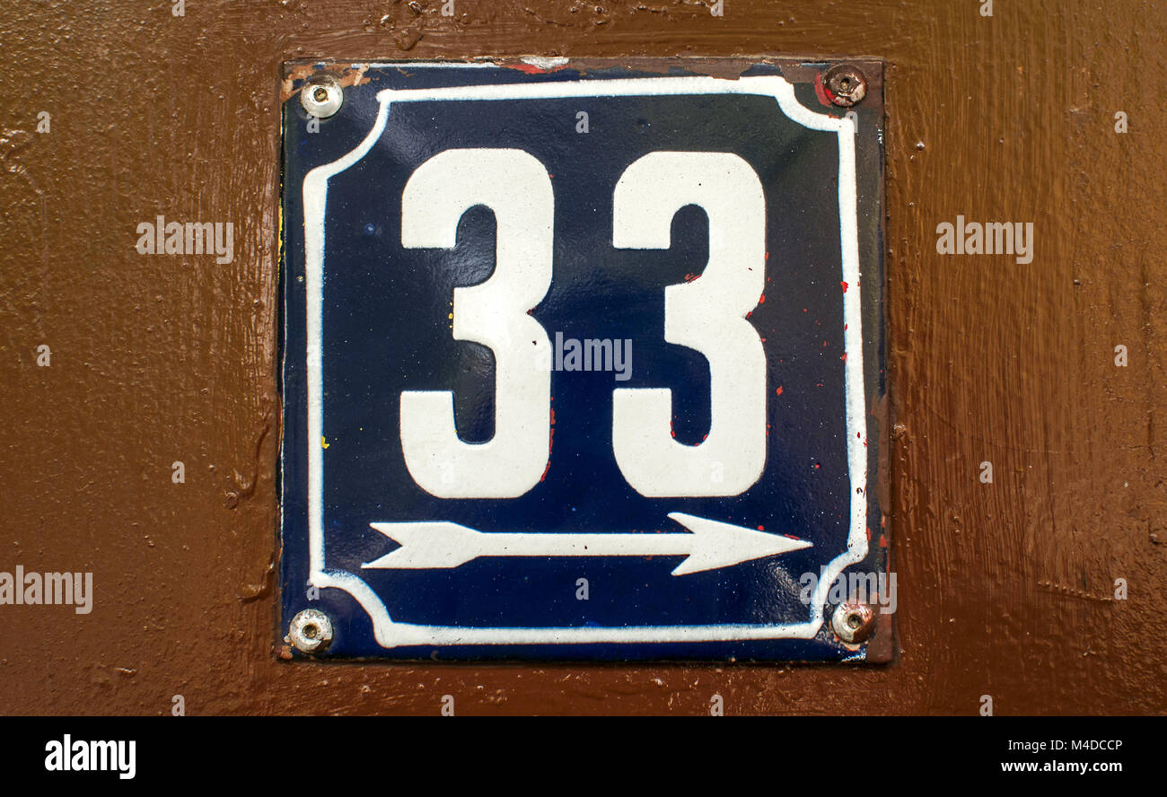 Weathered enameled plate number 33 Stock Photo - Alamy Weathered enameled plate number 33 Stock Photo - Alamy