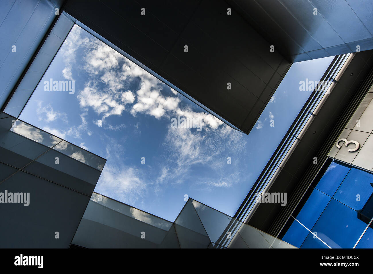 Abstract architectural geometry acting as rectangular frame for the sky ...