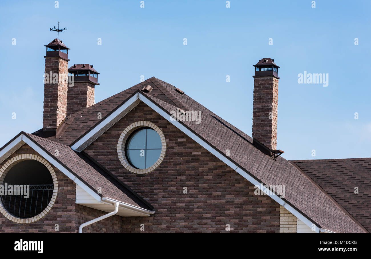 house with a gable roof window Stock Photo - Alamy