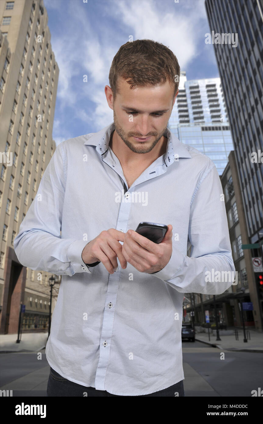 Man typing sms messages hi-res stock photography and images - Alamy