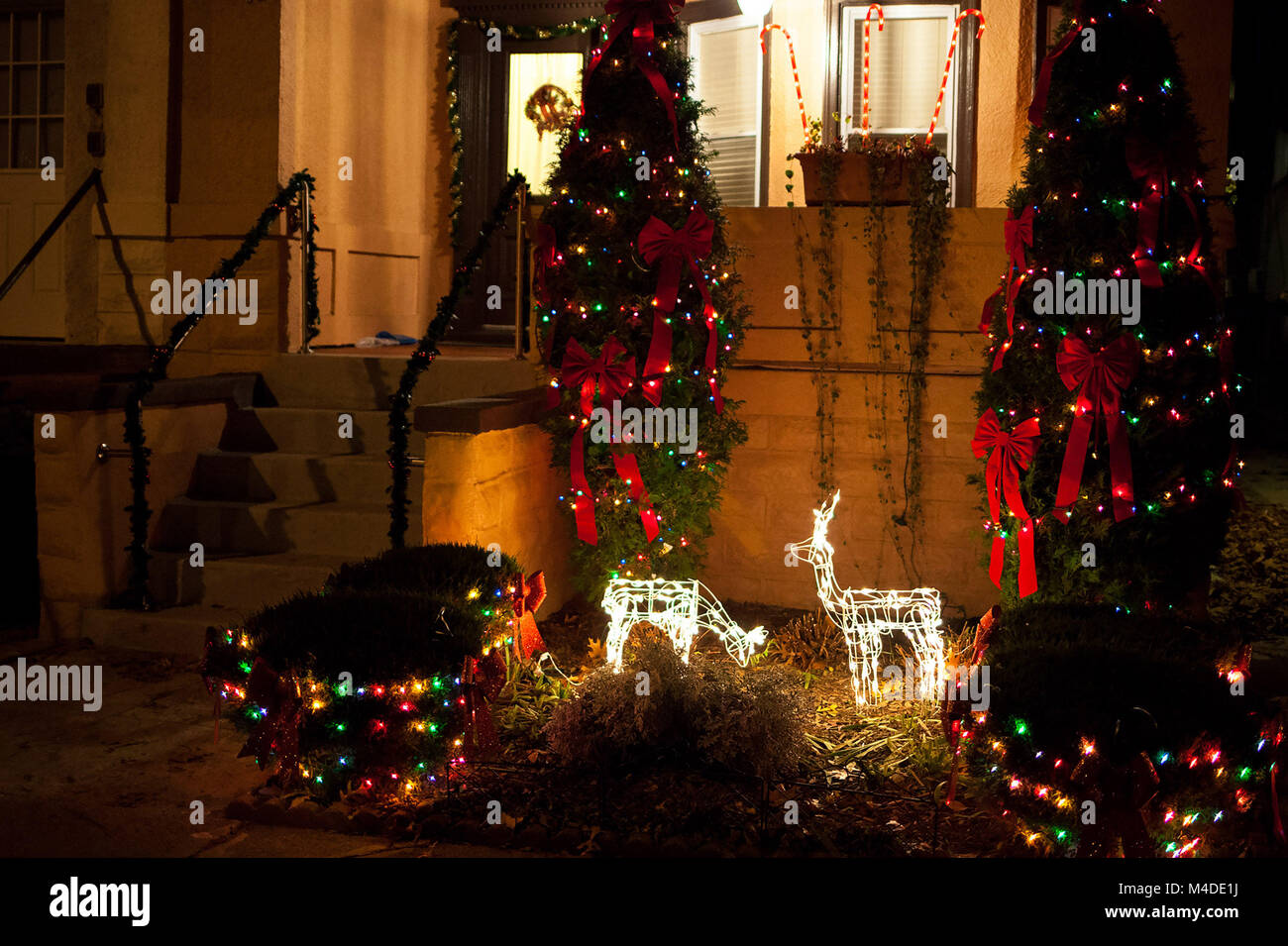 Christmas themes and toys at night outside Stock Photo - Alamy